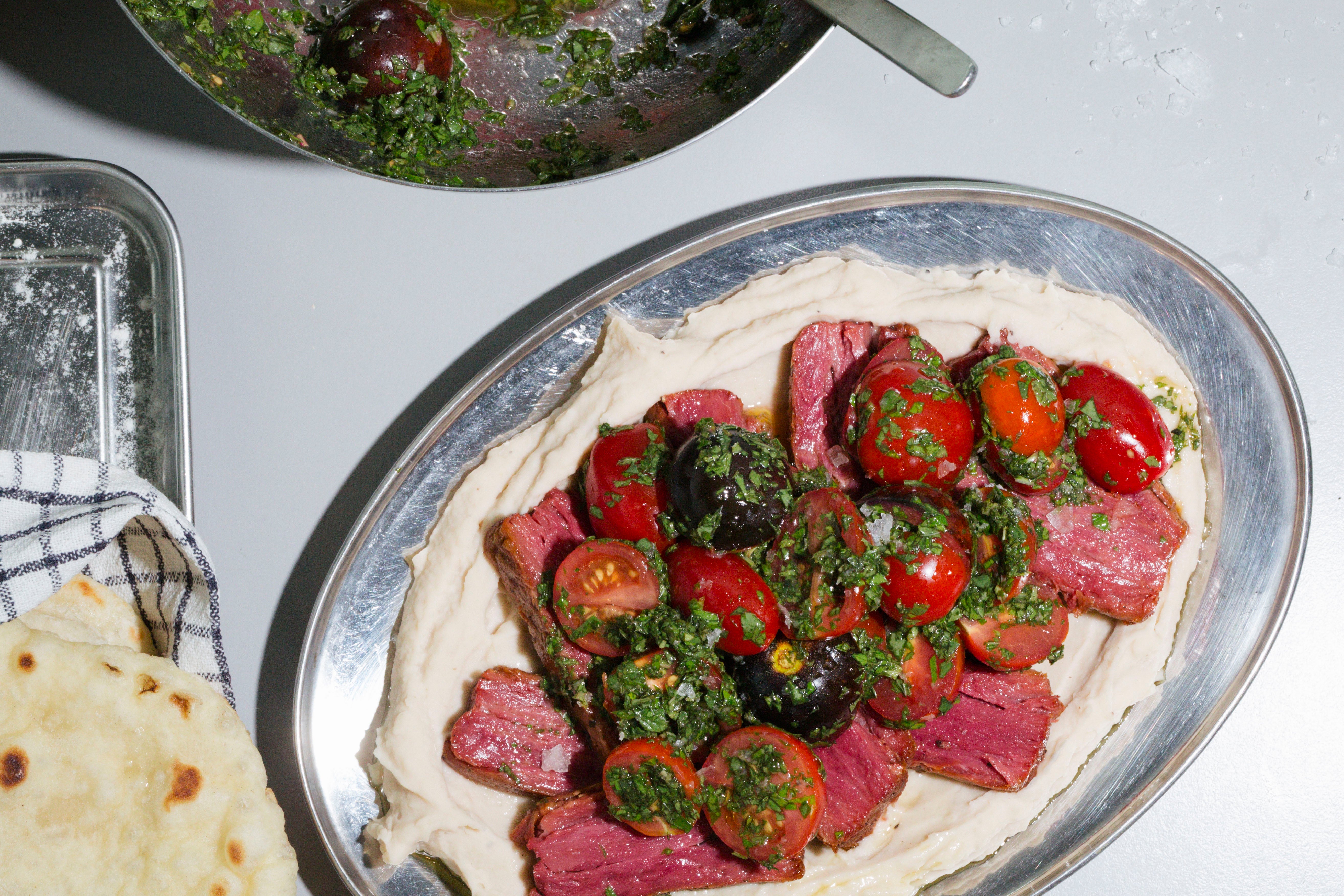 Plant-Based Lamb on Warm Creamy Bean Puree and Herby Marinated Tomatoes ...